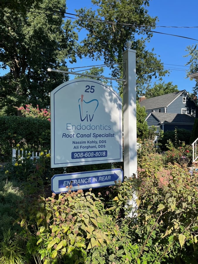 Liv Endodontics Welcomes Patients with a Custom Hanging Sign in Summit, NJ