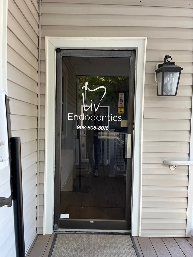 Liv Endodontics Welcomes Patients with a Custom Hanging Sign in Summit, NJ