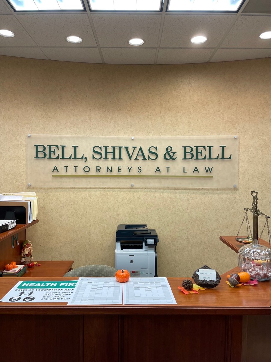 Law Firm Adds Curved Acrylic Panel Lobby Sign with Printed Overlays in ...
